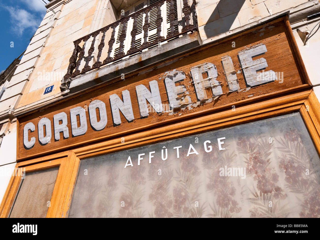 Old faded Cordonnerie shop front sign - France Stock Photo - Alamy