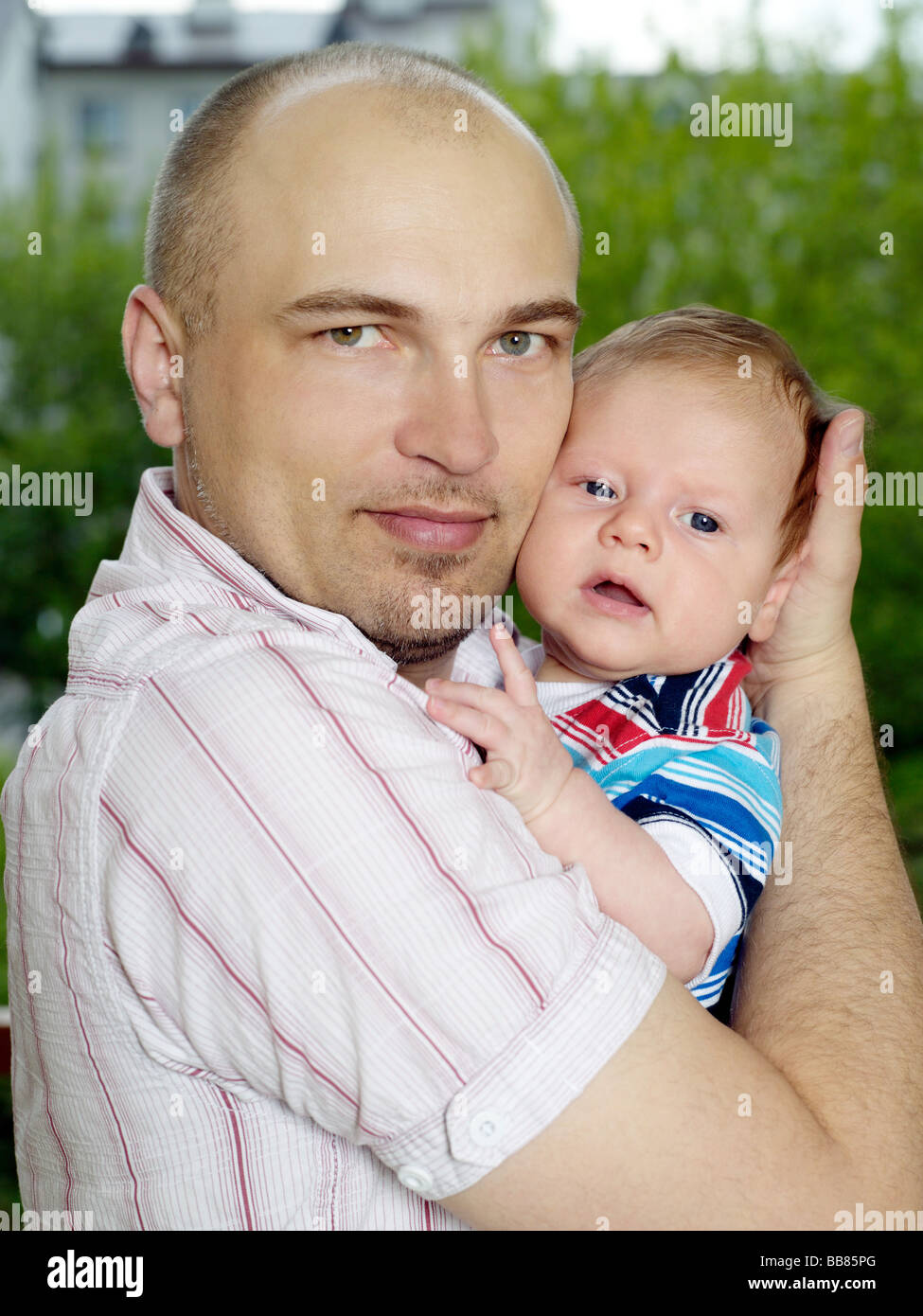 1250545 people close up portrait two man father dad 30 35 years smile ...