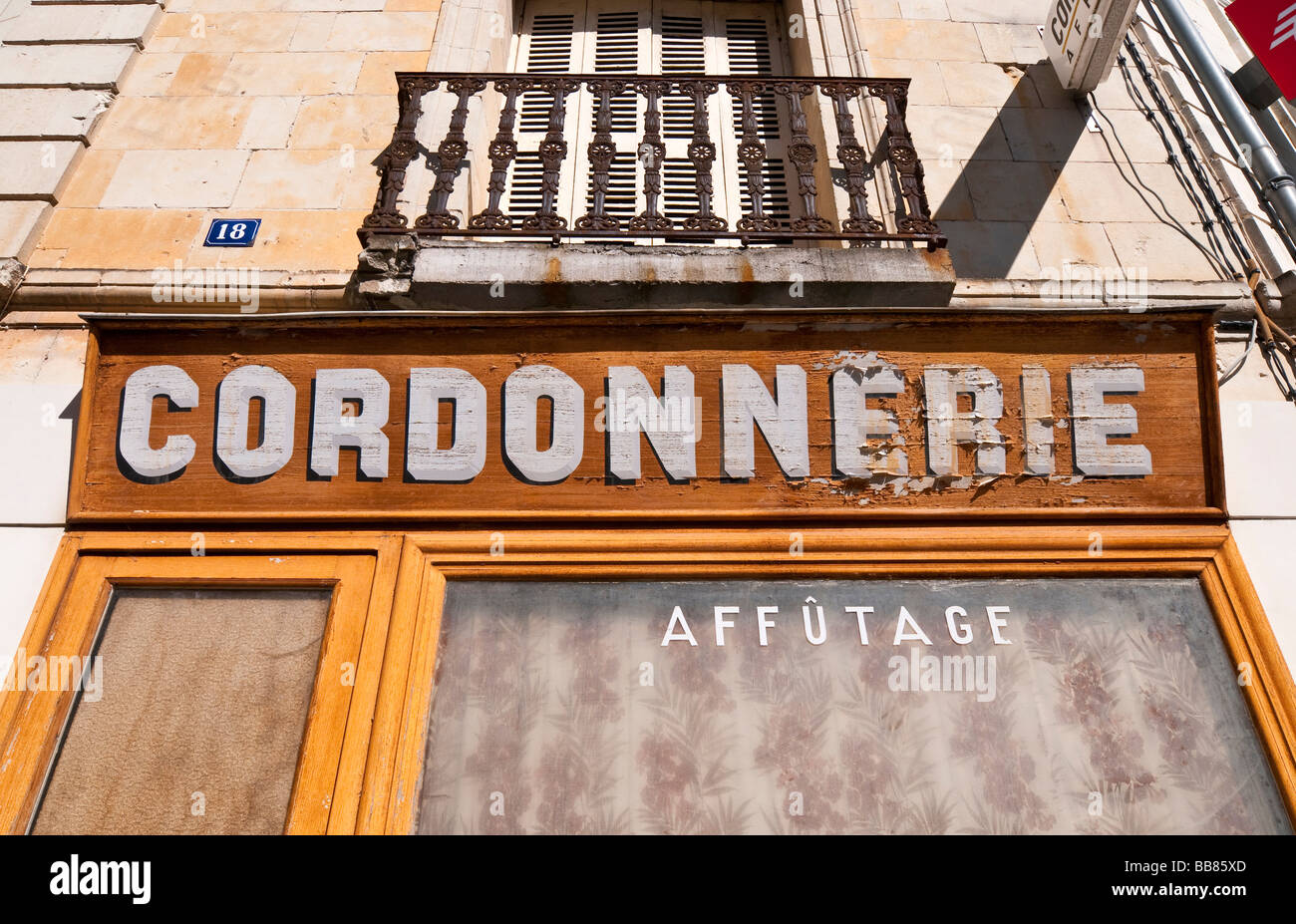 Old faded Cordonnerie shop front sign - France Stock Photo - Alamy