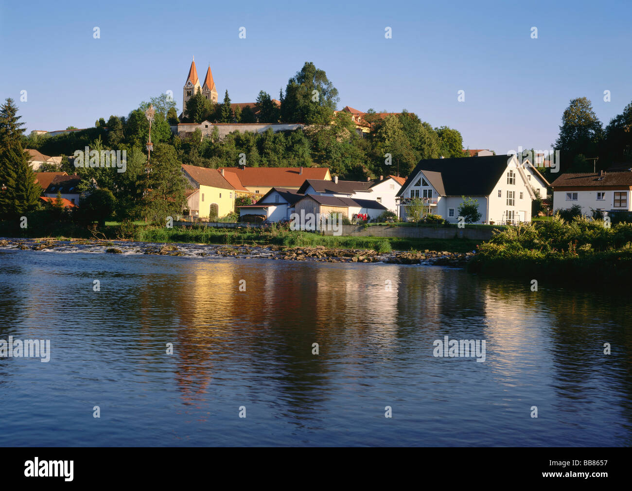 Former Benedictine monastery church Mary Assumption on the river Regen ...