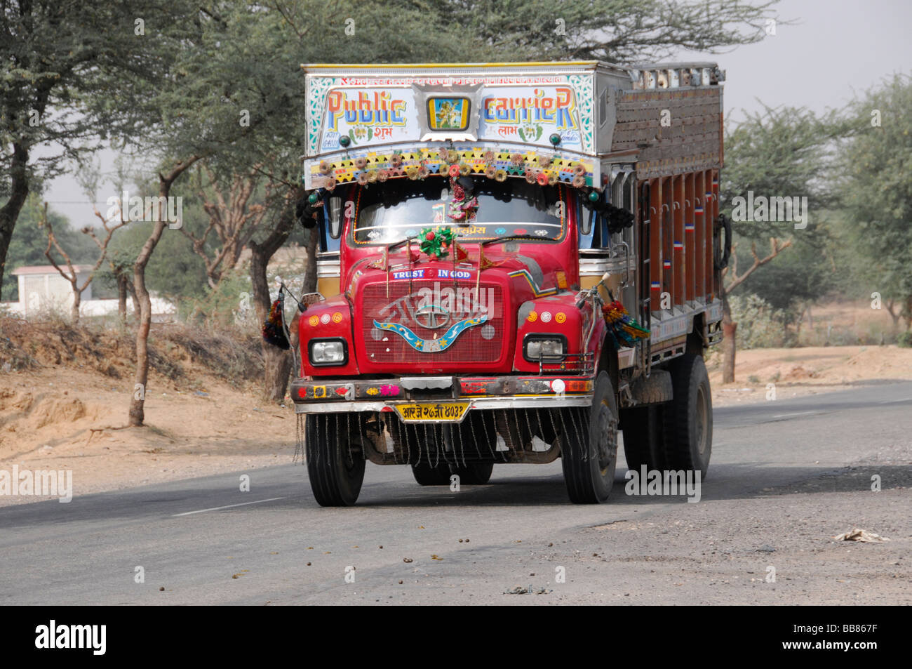 Decorated vehicle driving between Bikaner and Jaipur, Rajasthan, North ...