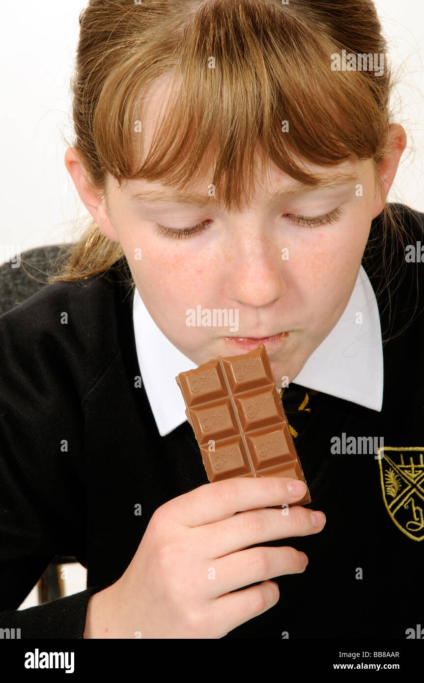 Children eating chocolate bars hi-res stock photography and images - Alamy