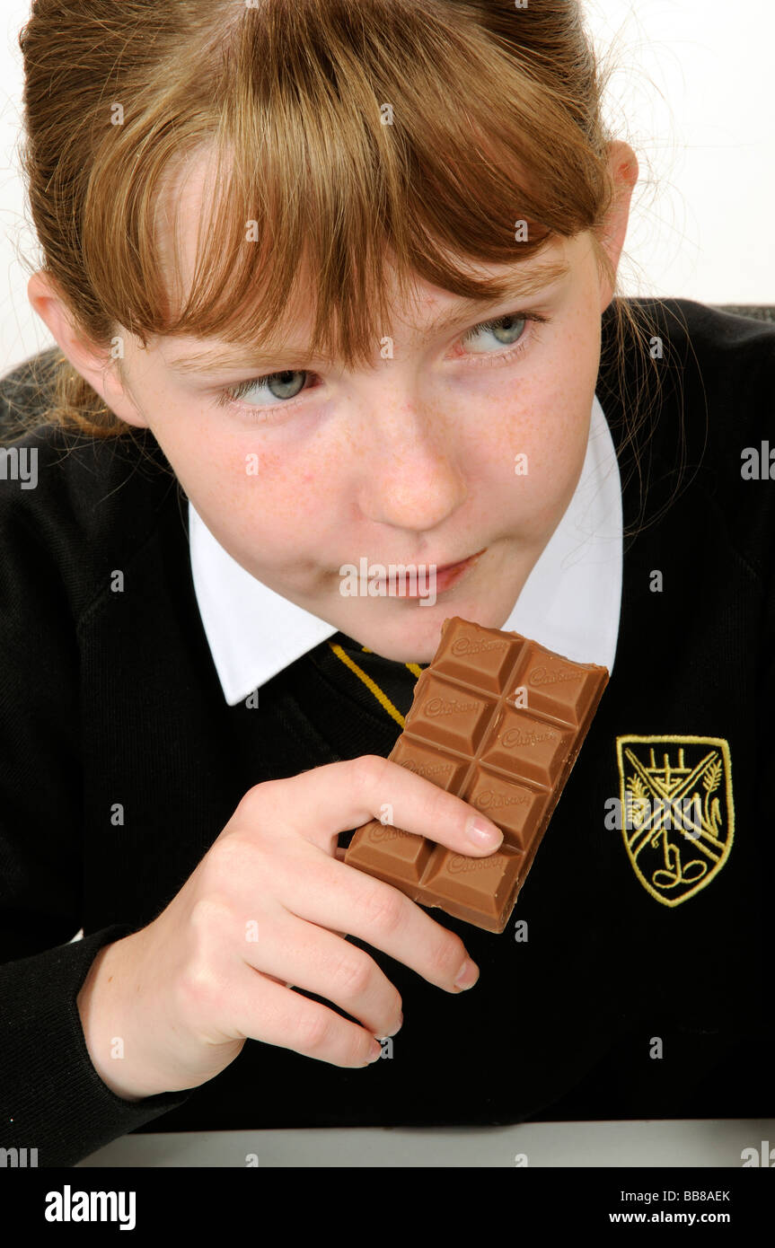 Children eating chocolate bars hi-res stock photography and images - Alamy