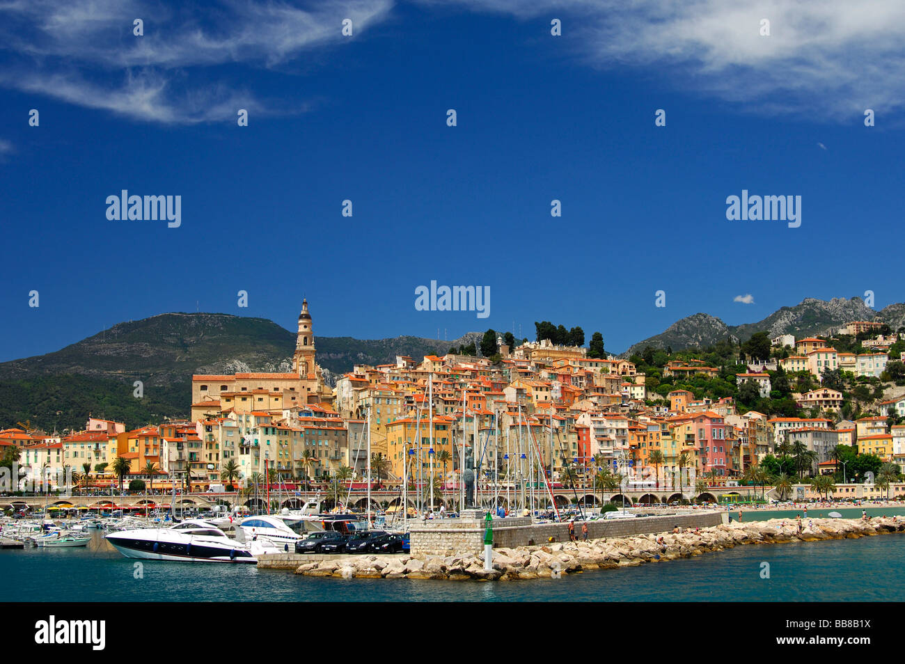 The old port with the impressive backdrop of Menton old town and the ...