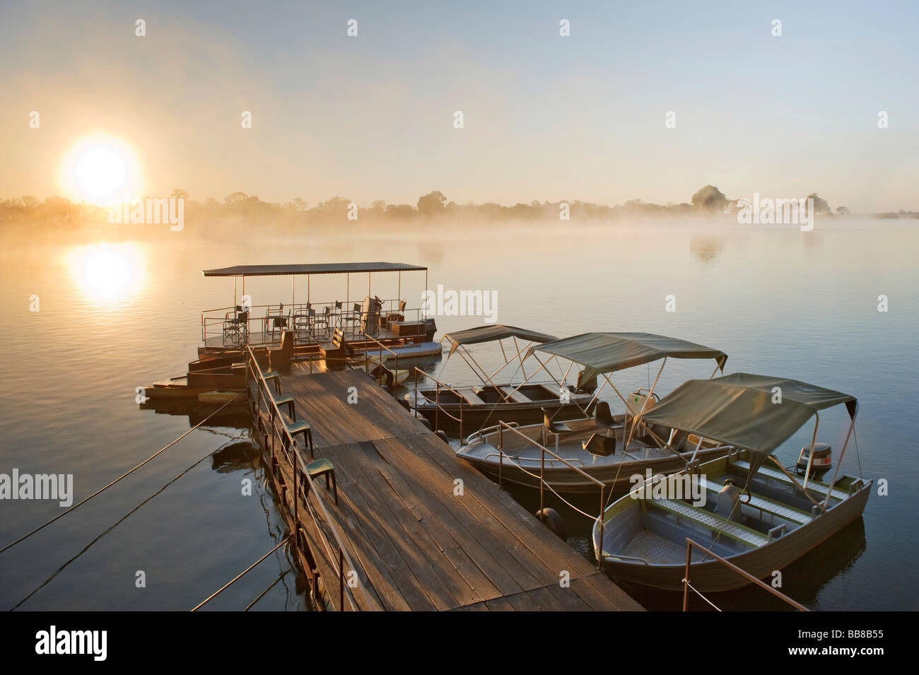 Wharf of the Mahangu Safari Lodge at dawn, Okavango, Namibia, Africa ...