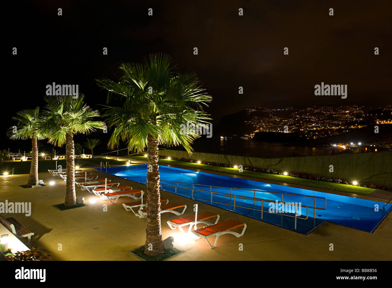 Swimming pool with palm trees at a hotel in Funchal, Madeira, Portugal ...