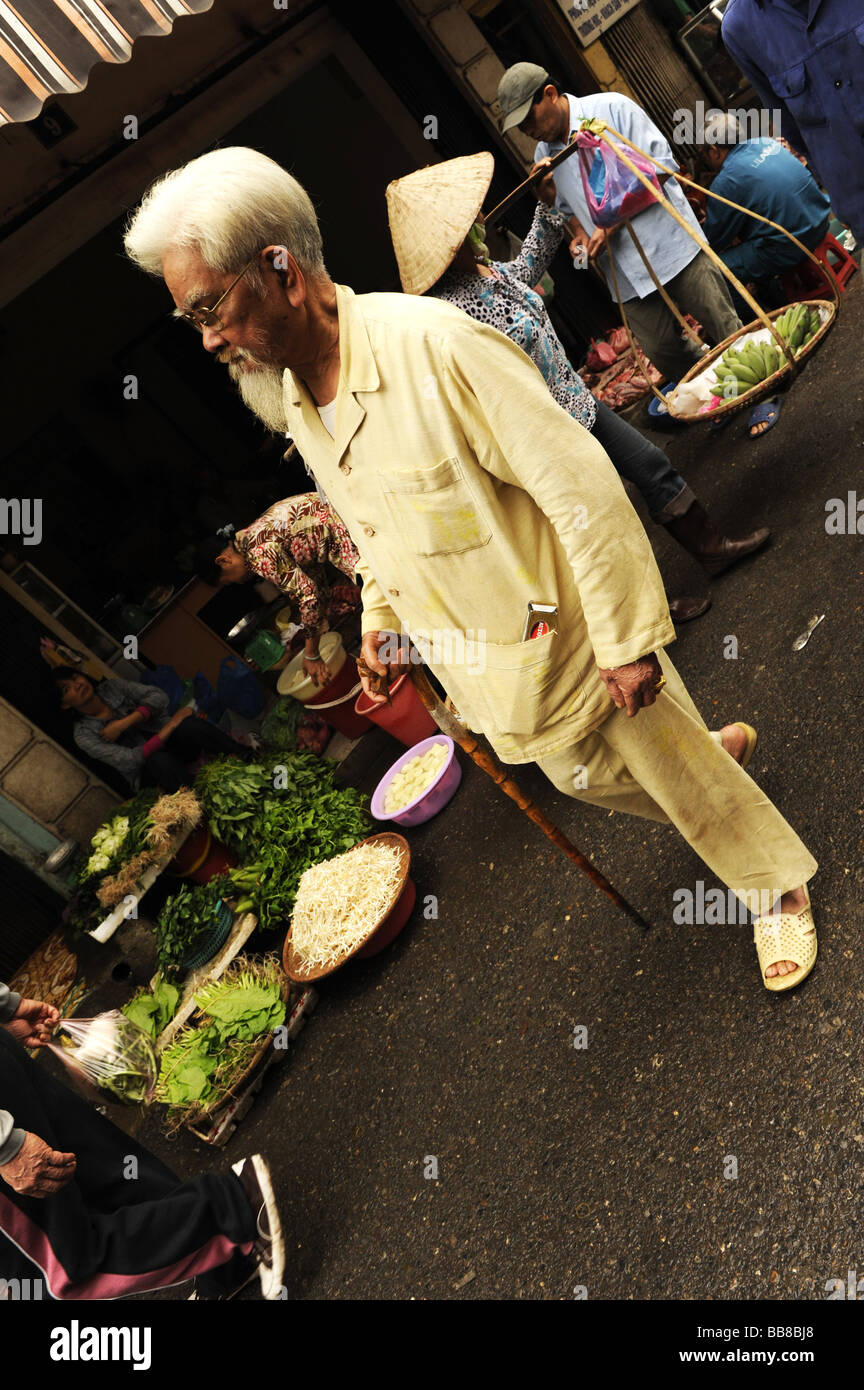 typical vietamese beard man with old traditional dress walking in the ...