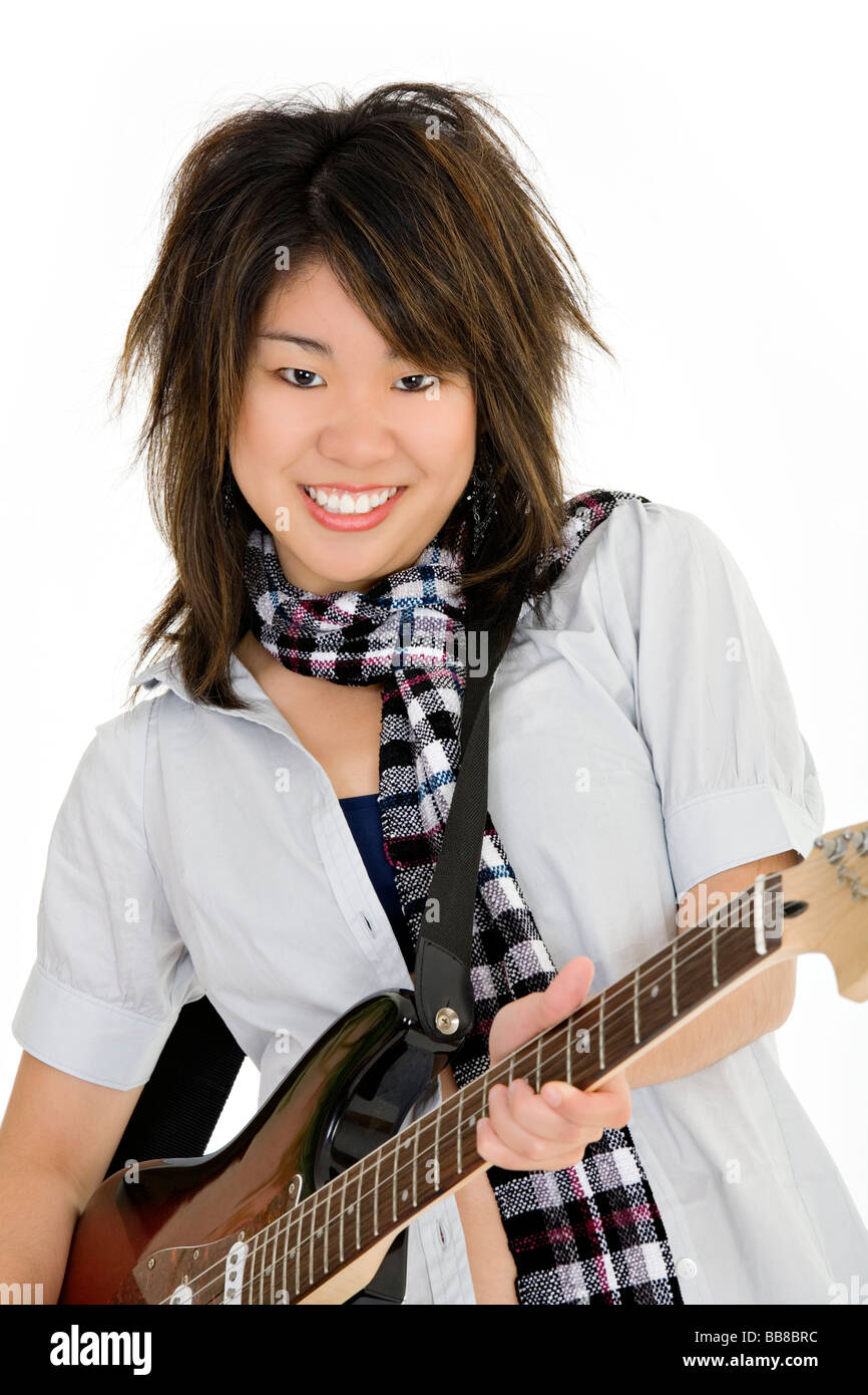 Caucasian teenager posing as a punk rocker on white background Stock ...