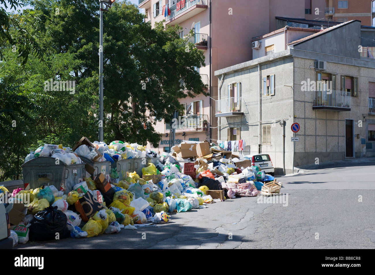 Garbage next to street, Enna, Sicily, Italy Stock Photo - Alamy