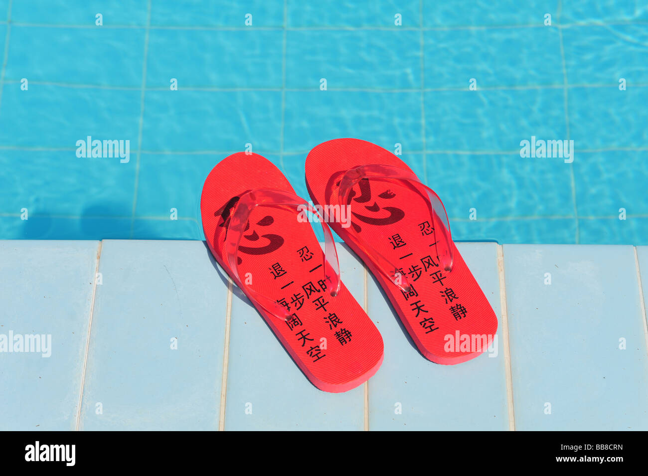 Flip flops sandals swimming pool hi-res stock photography and images - Alamy