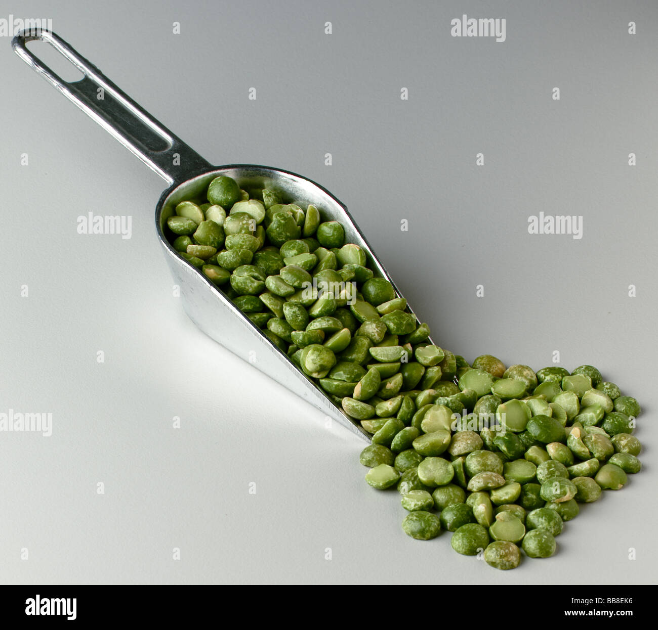 Scoop of green split peas Stock Photo - Alamy