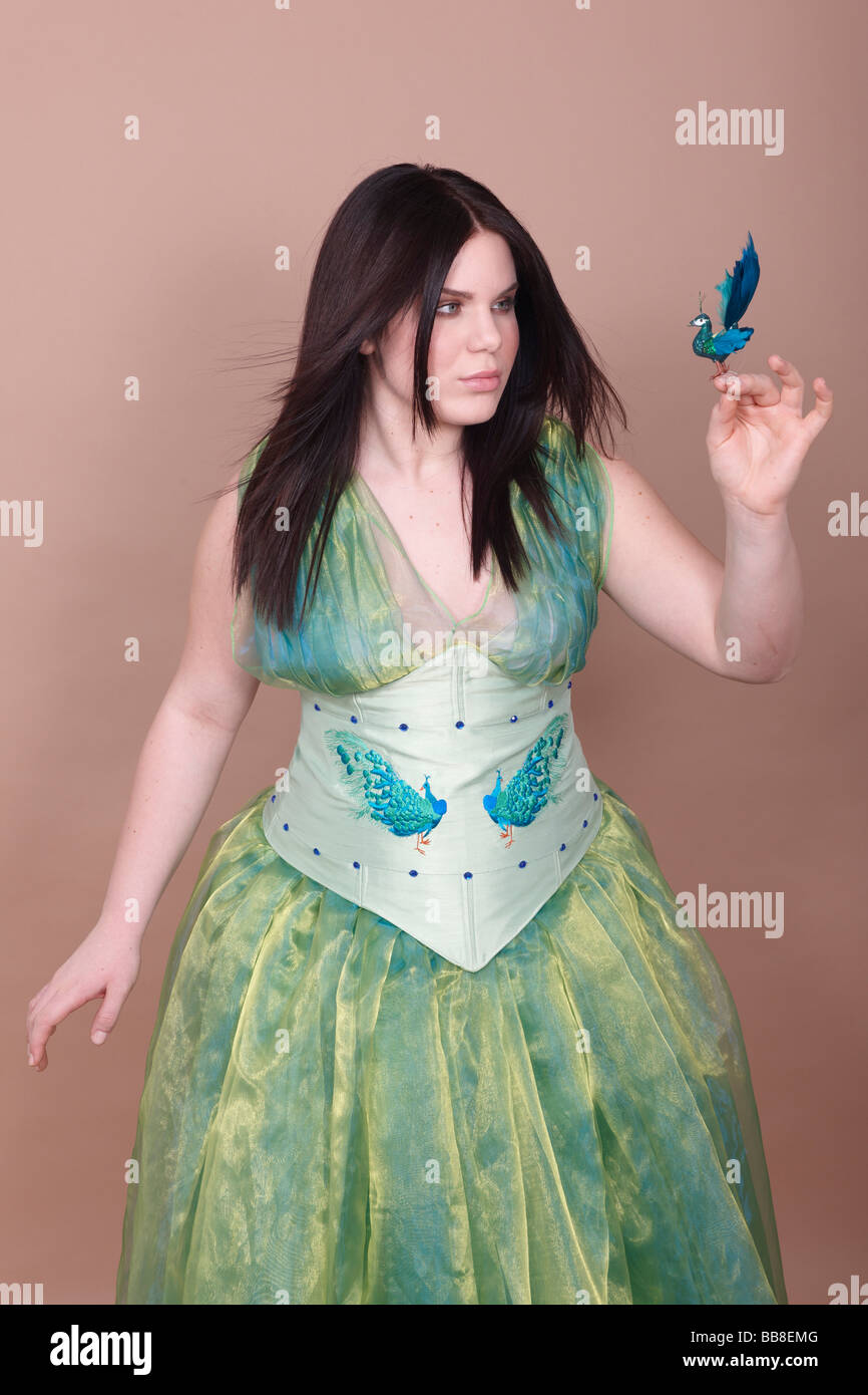 Princess with magic bird Stock Photo - Alamy