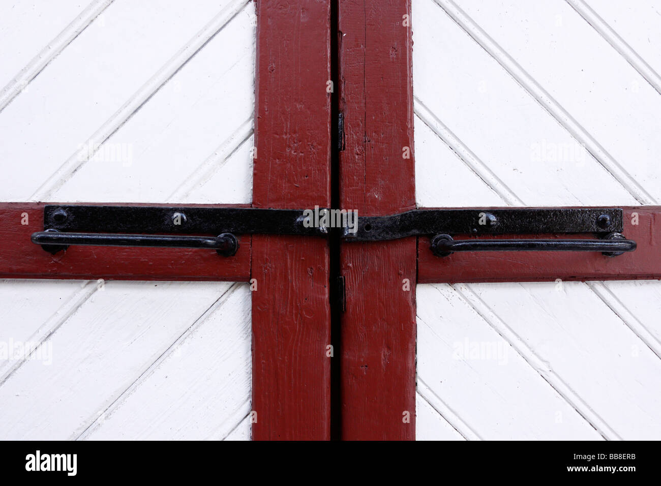 Wooden gate with red wooden cross Stock Photo - Alamy