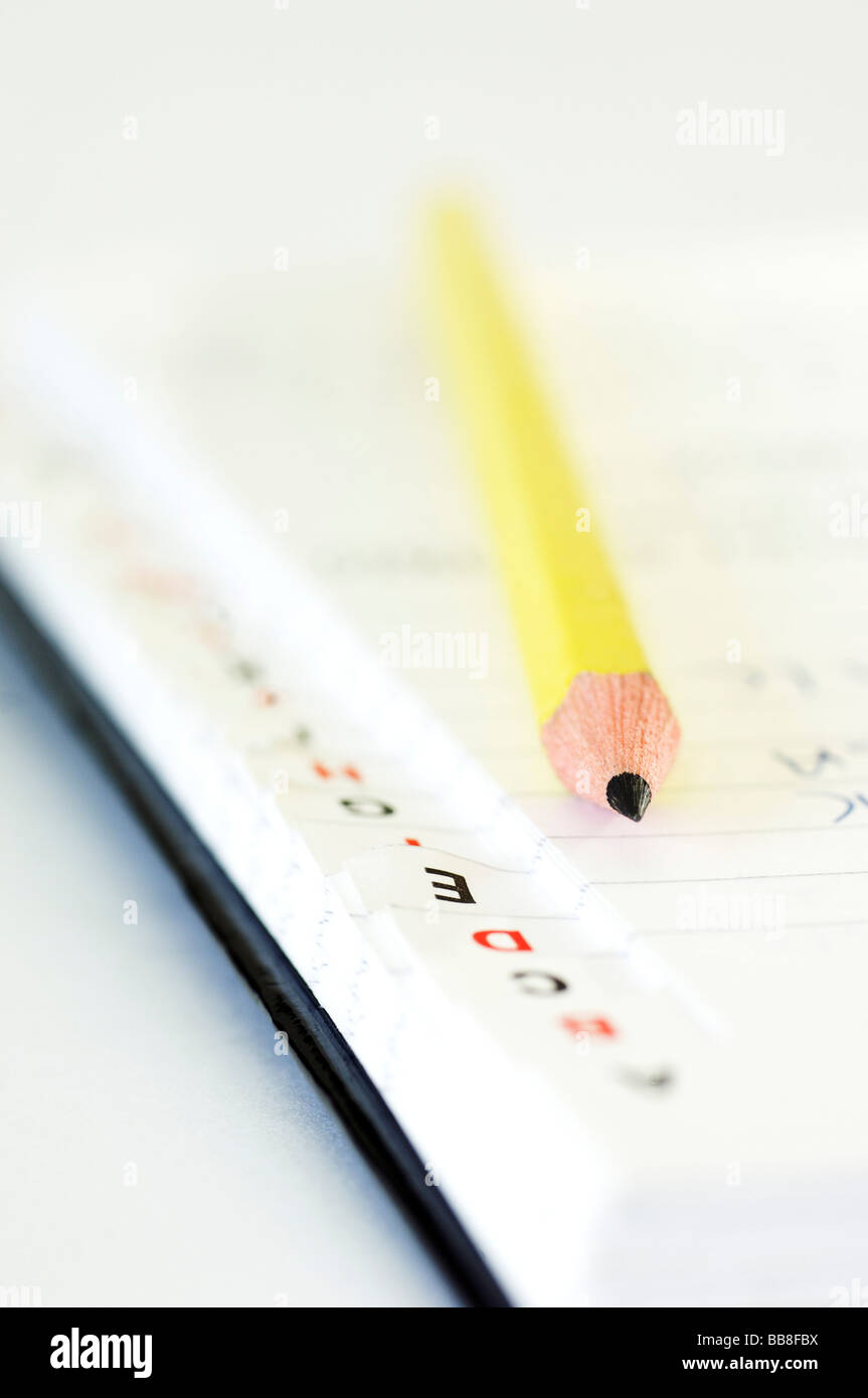 Pencil and contact book Stock Photo - Alamy
