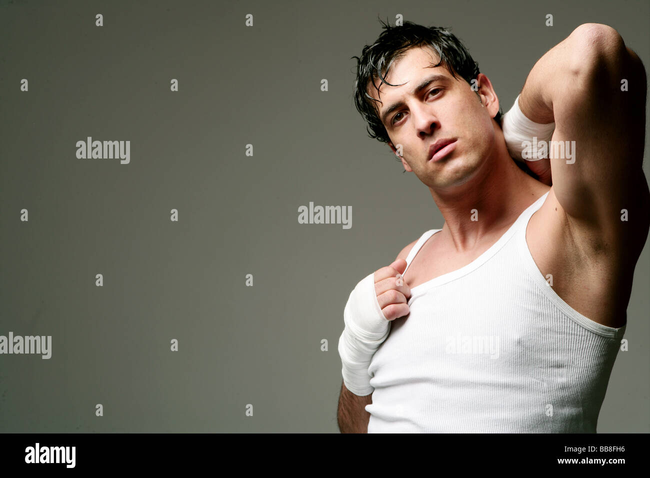 Portrait of a attractive man looking strong Stock Photo - Alamy