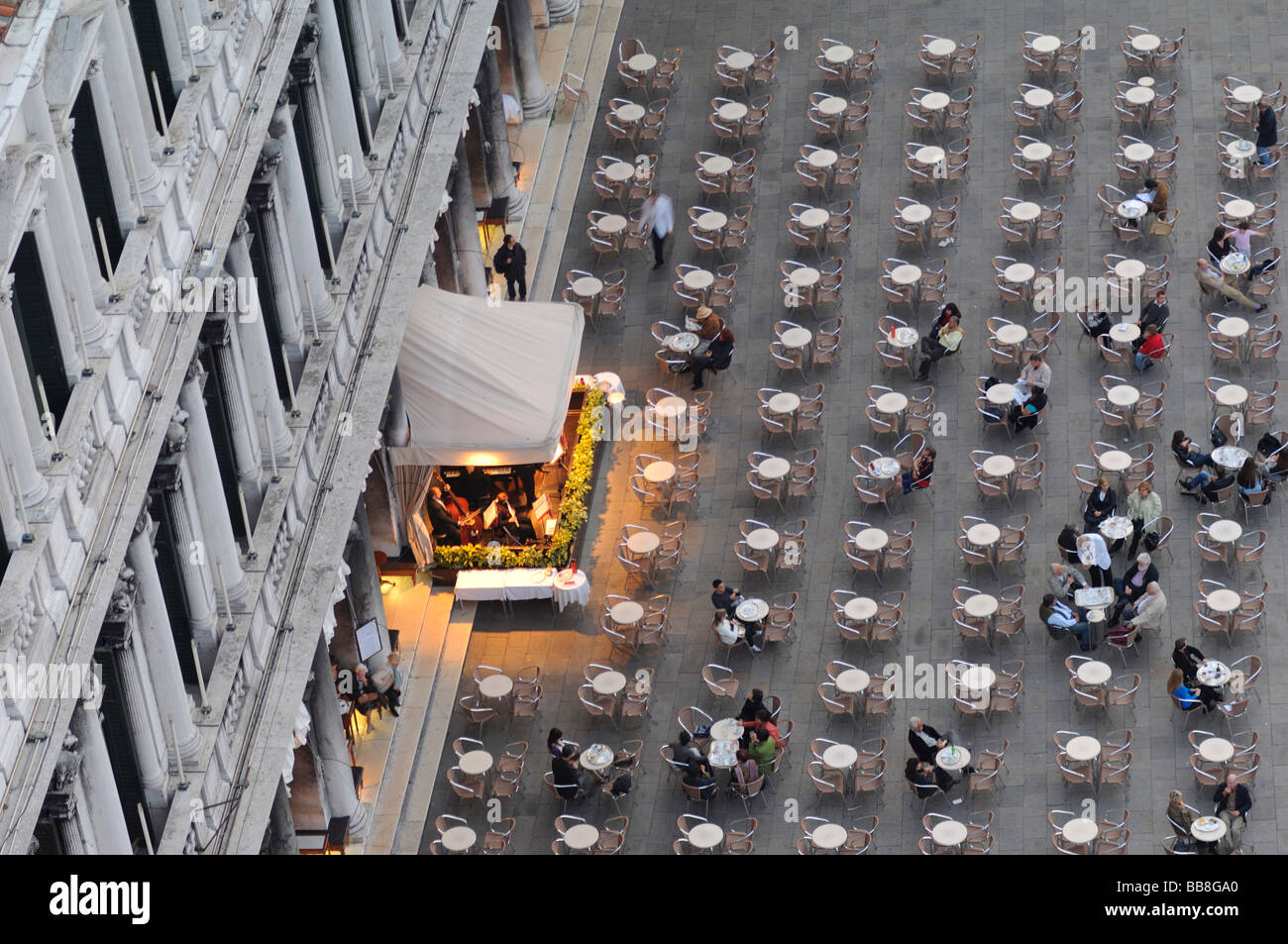 Bistro tables of a cafe on St. Mark's Square, Venice, Italy, Europe ...