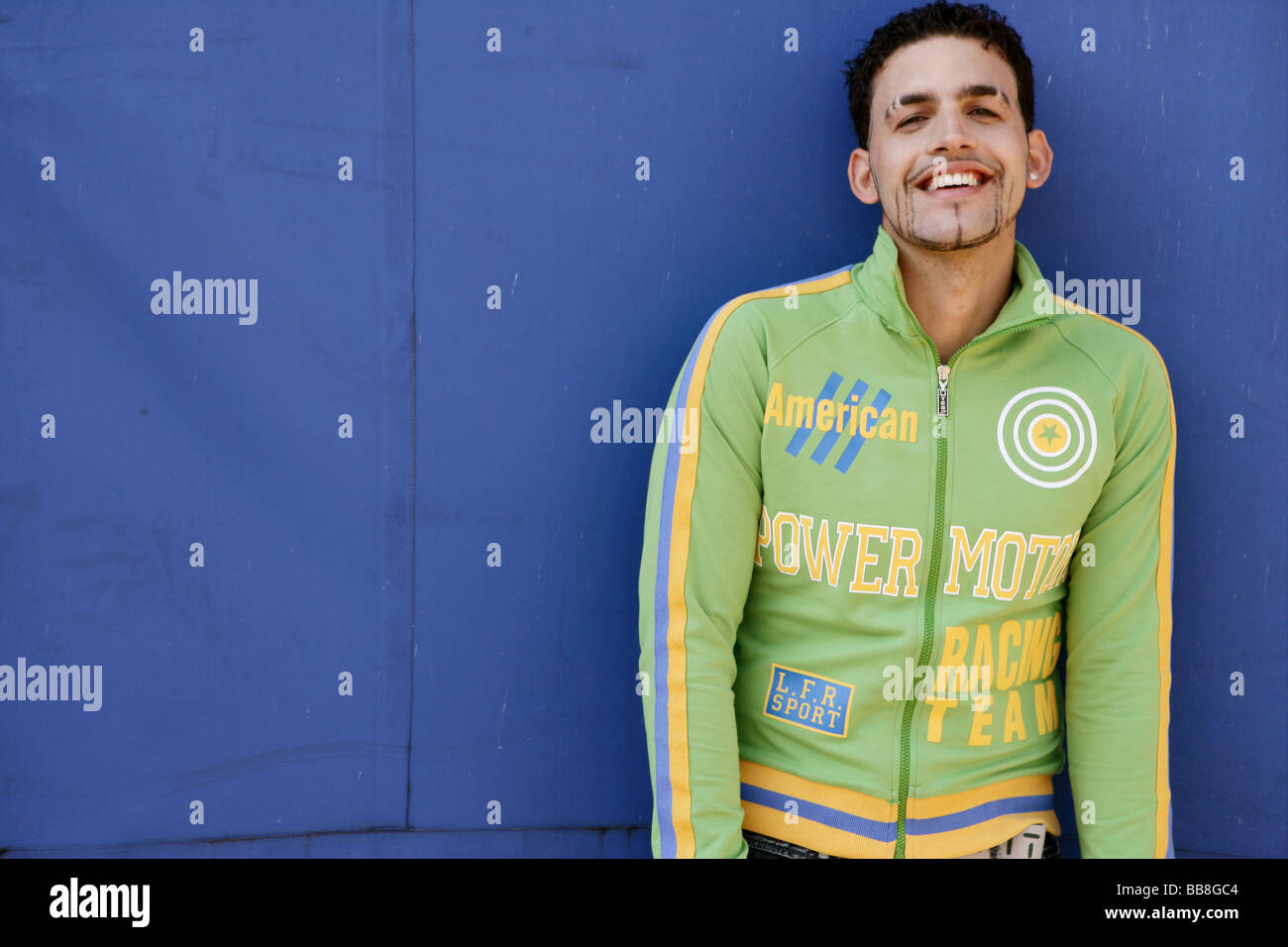 Portrait of a freaky happy latino man Stock Photo - Alamy