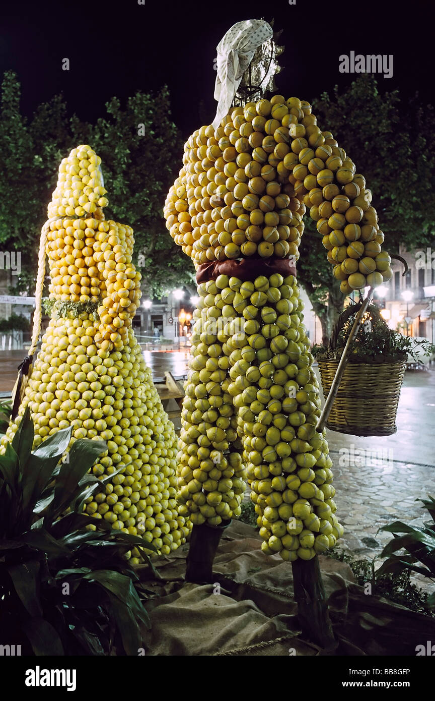 Two figures made of citrus fruit, decorations for the Orange Festival ...