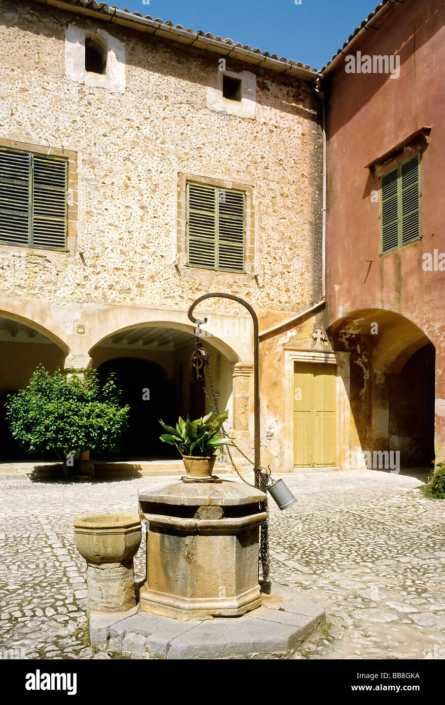 La Raixa country estate, historic manor, inner courtyard with well ...