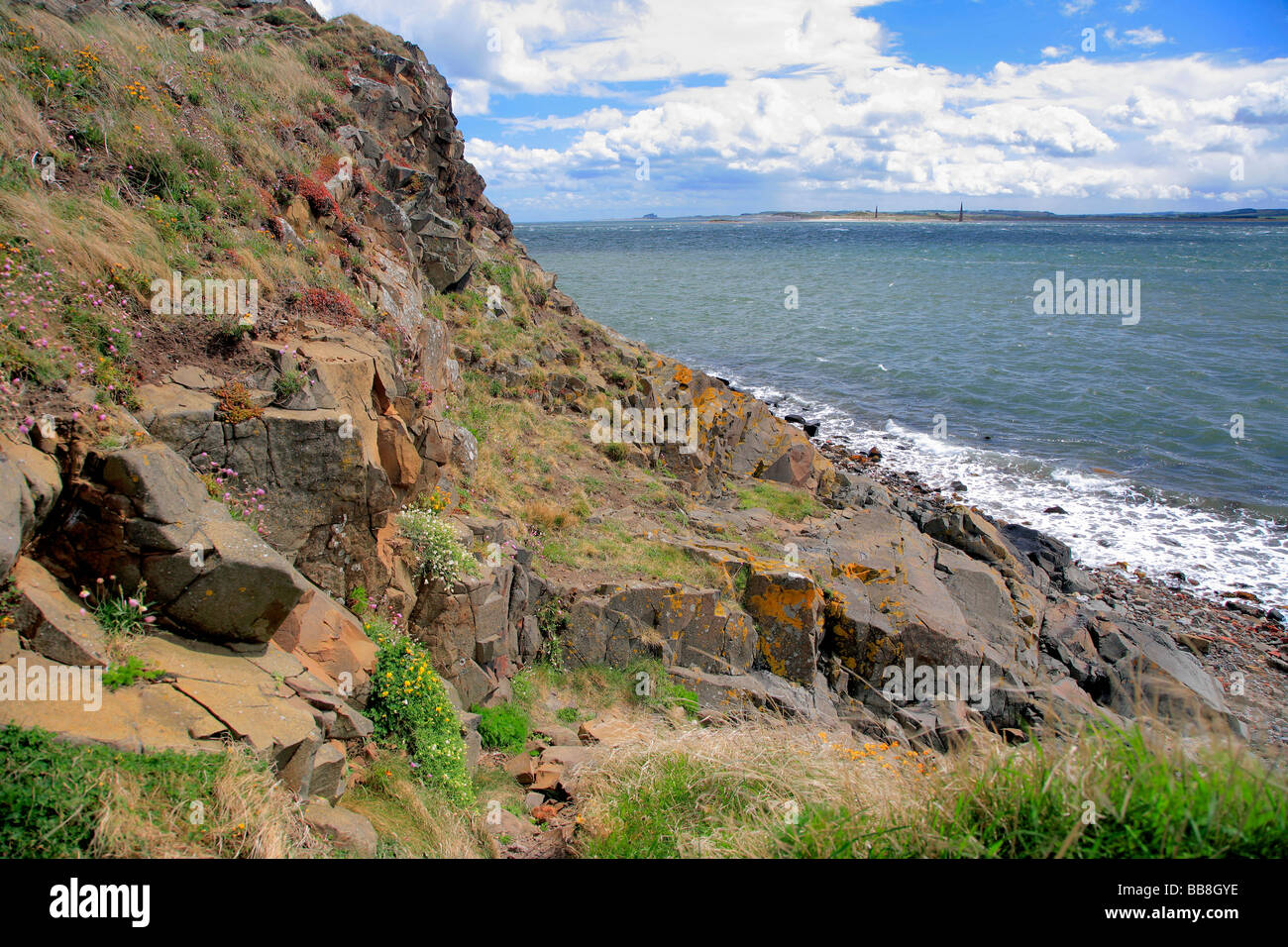 The Heugh Whinstone Ridge protecting the Harbour at Holy Island ...
