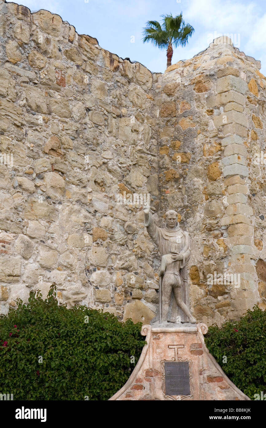 Statue in front of the Great Stone Church at Mission San Juan ...