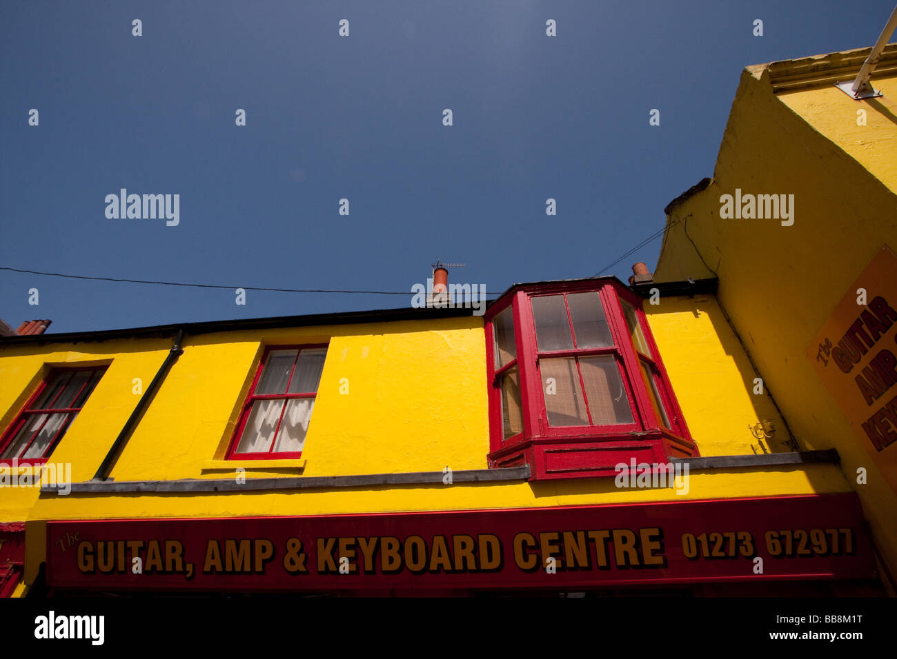 Red and yellow building in Brighton Stock Photo - Alamy