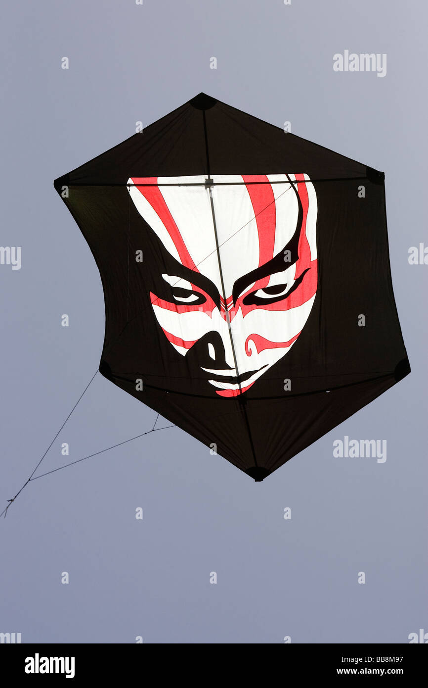 Kite with Picture of a Mask Stock Photo - Alamy