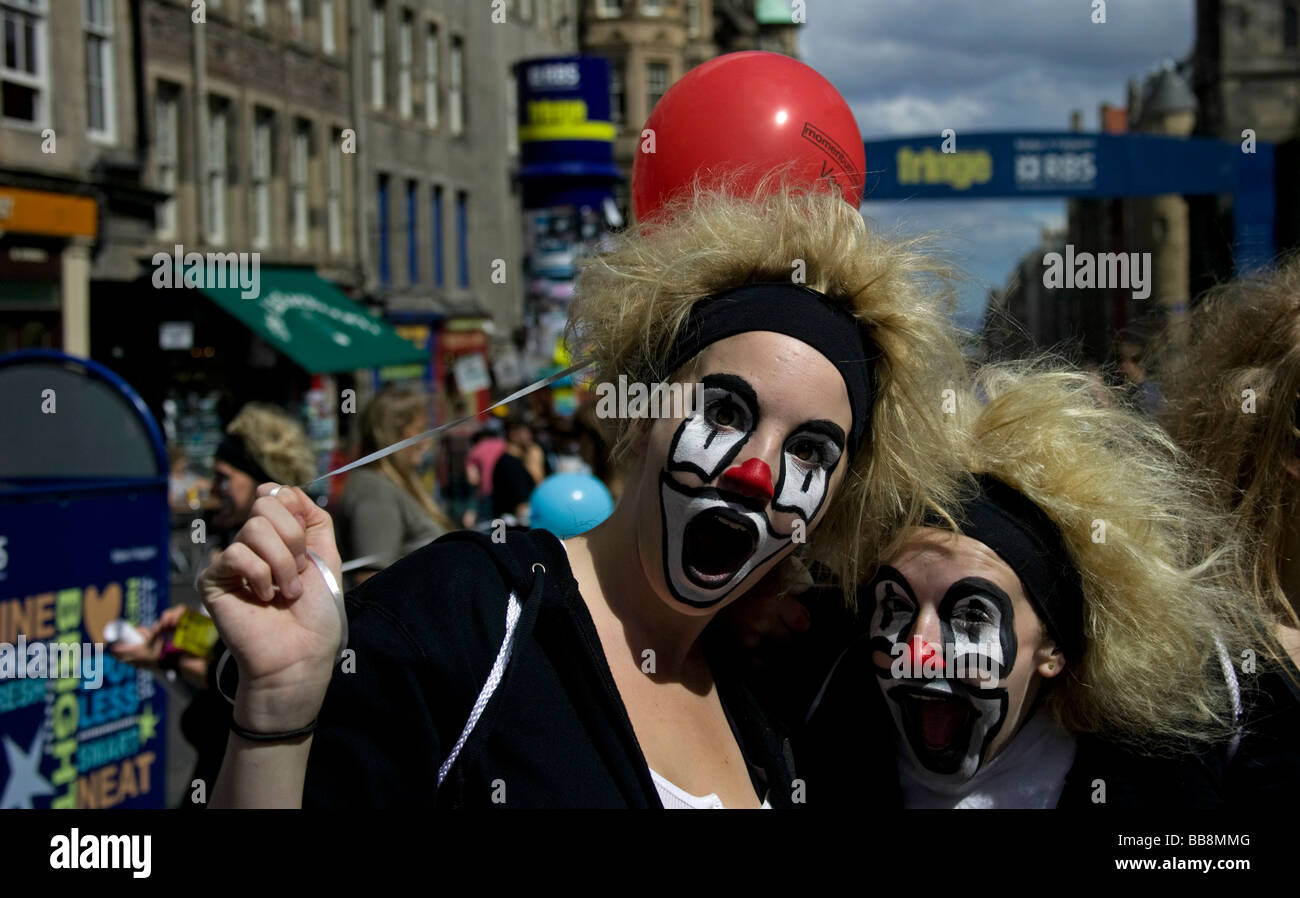 Street Performers made up as clowns entertain Edinburgh Fringe Festival ...