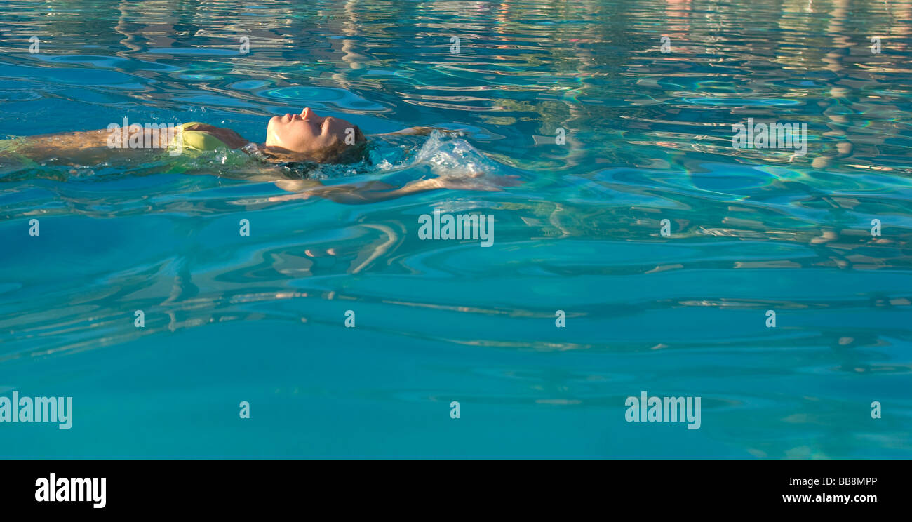 Swimmer laying on back Stock Photo - Alamy