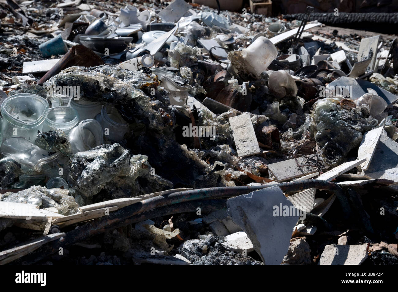Remains of household objects after a devastating bushfire Stock Photo ...