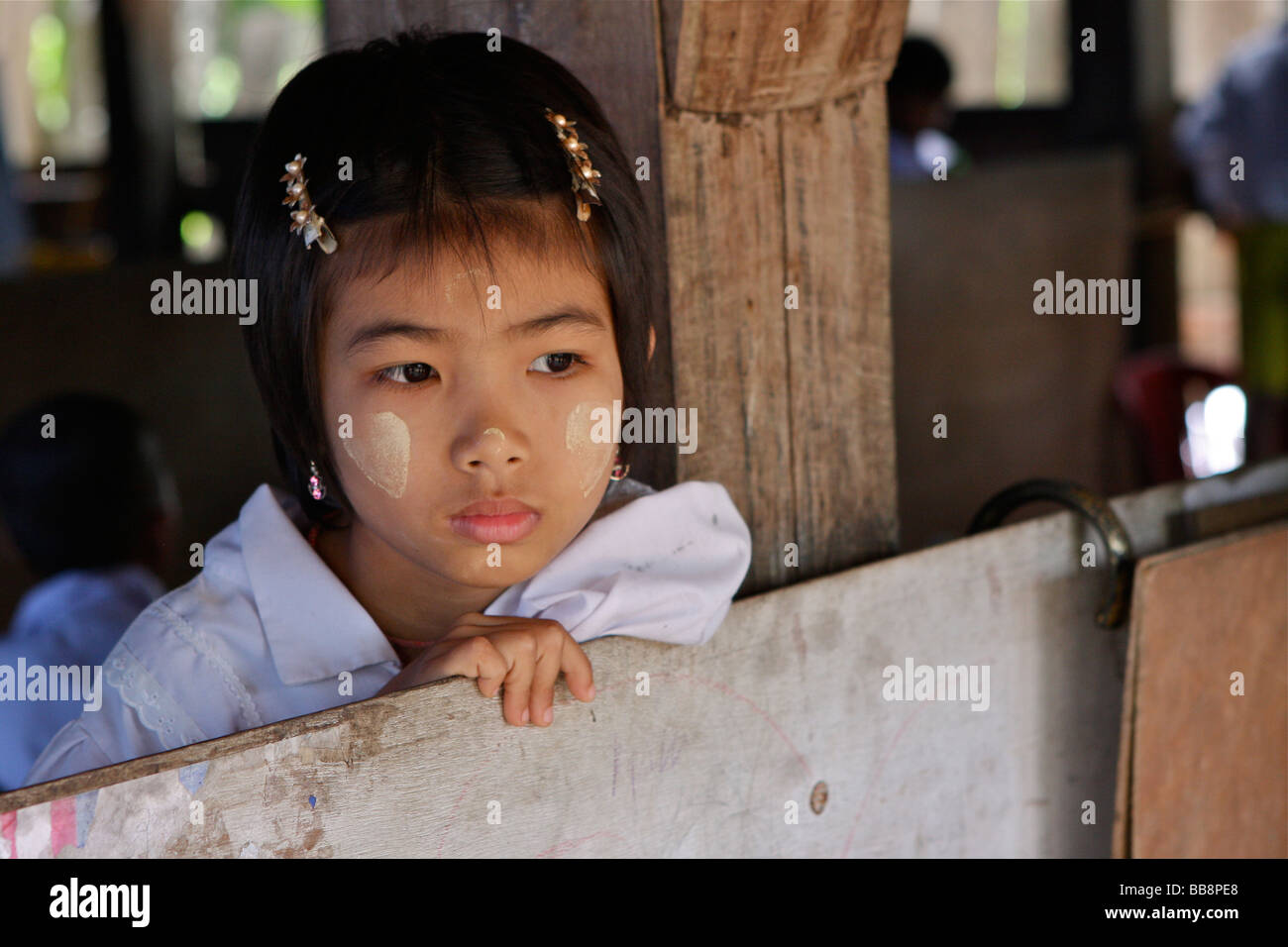 girl portrait behind a wall Stock Photo - Alamy