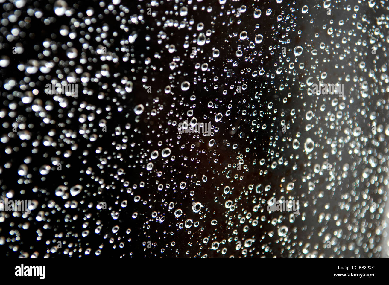 Rain drops running down window hi-res stock photography and images - Alamy