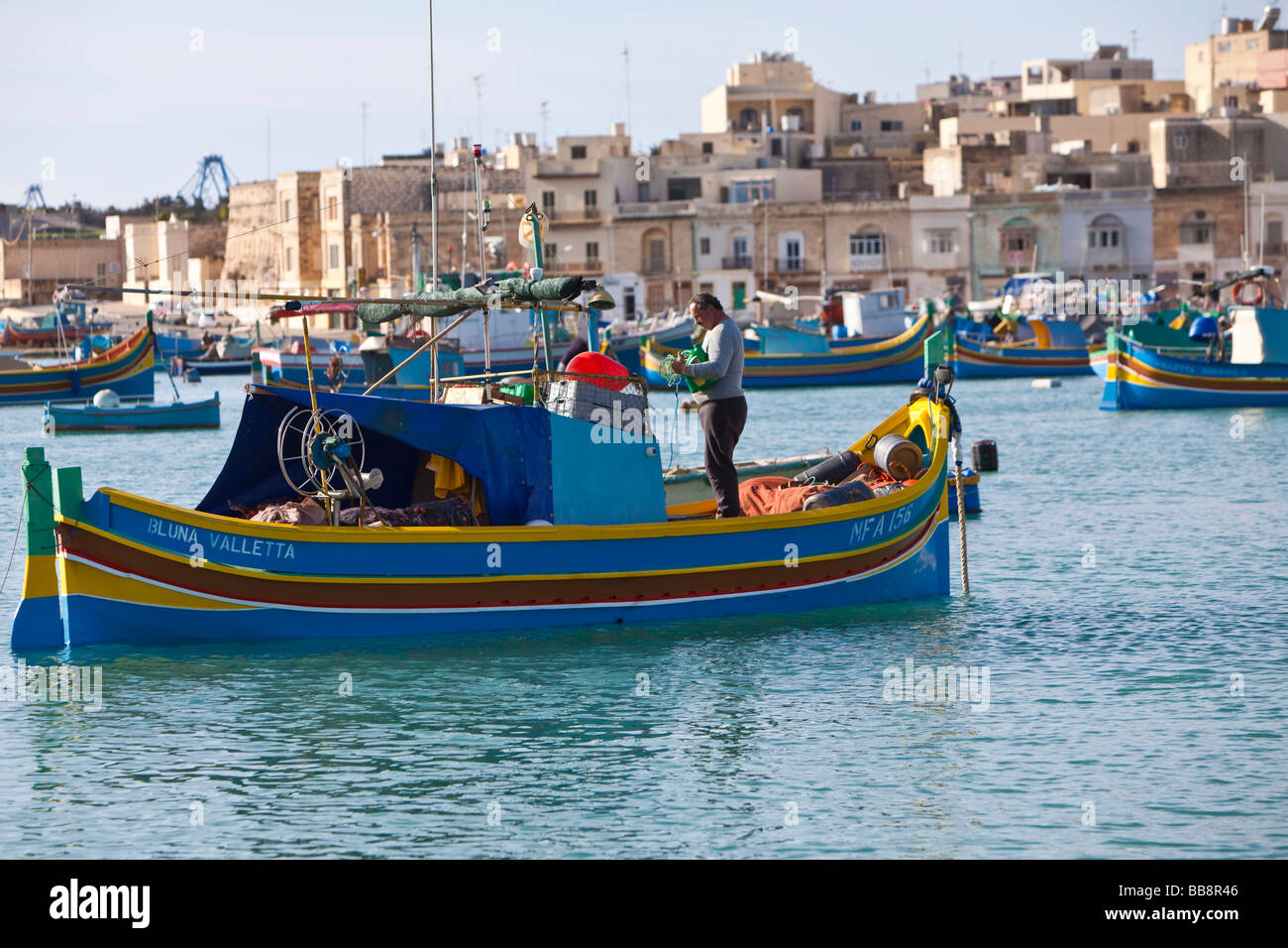 Traditional Maltese fishing boat, called Luzzu, port of Marsaxlokk ...