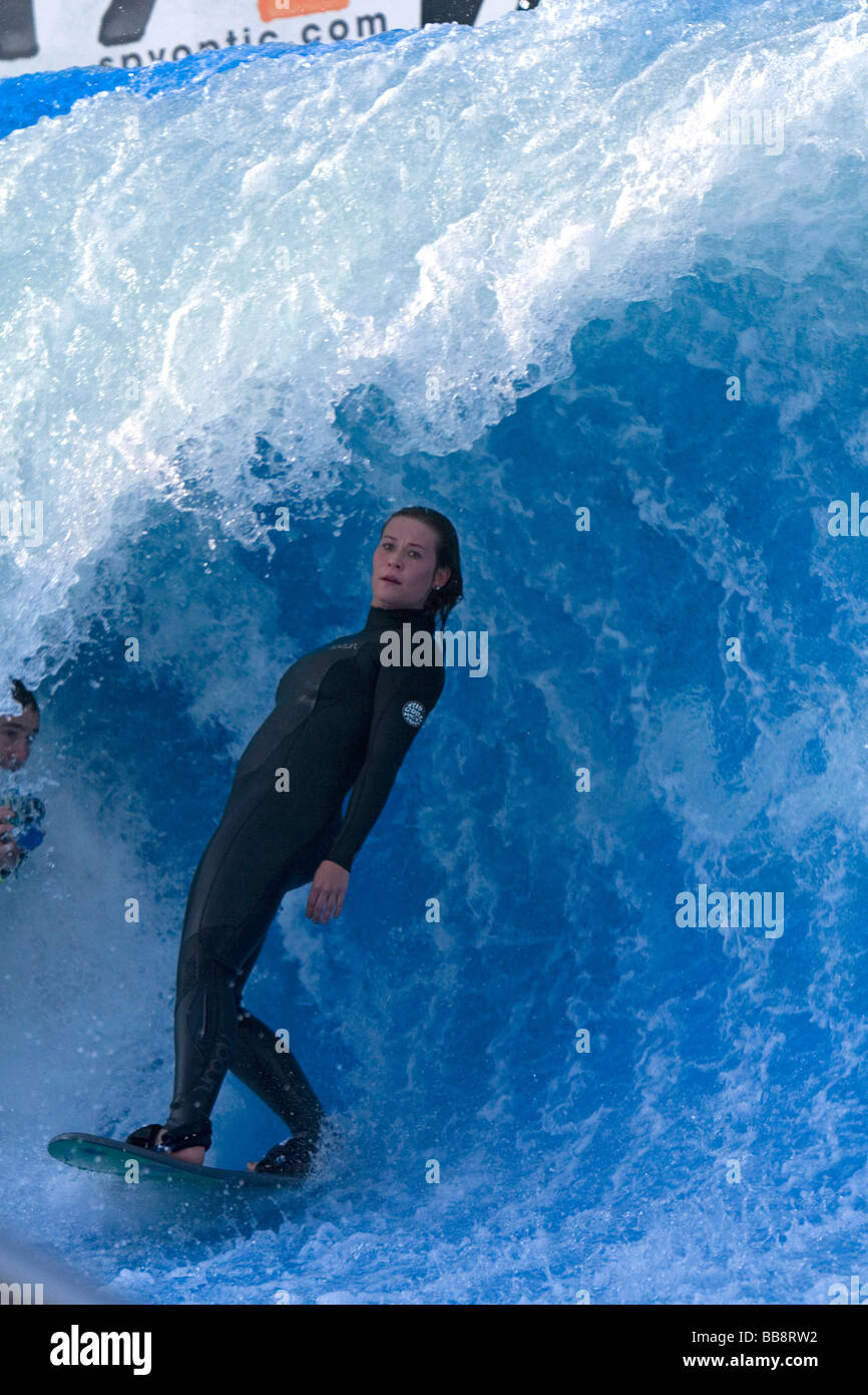 Woman surfing on a man made wave machine at Mission Beach San Diego ...