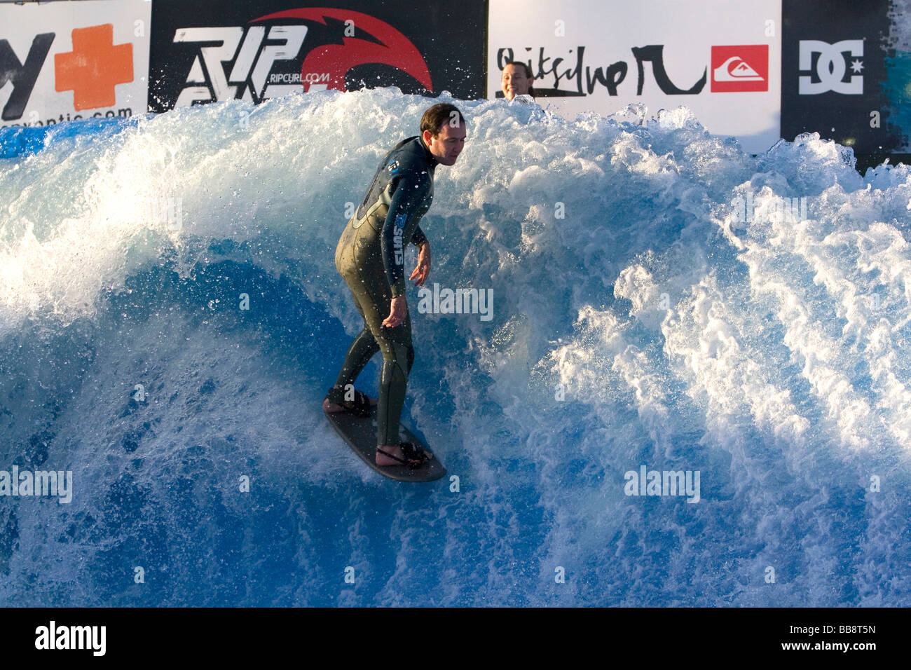 Man surfing on a man made wave machine at Mission Beach San Diego ...