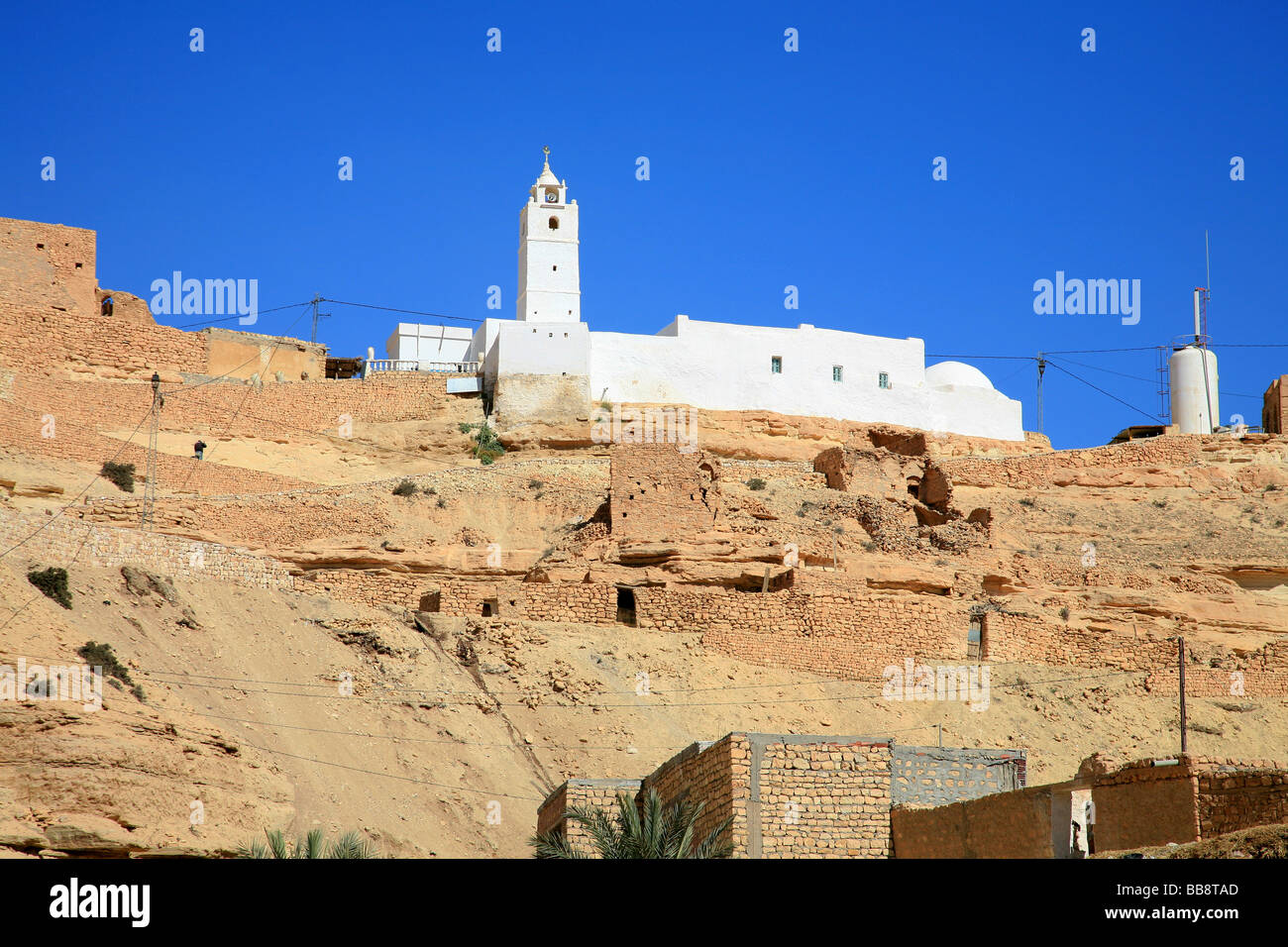 Ruined Berber village of Chenini in Tunisia with its prominent mosque ...