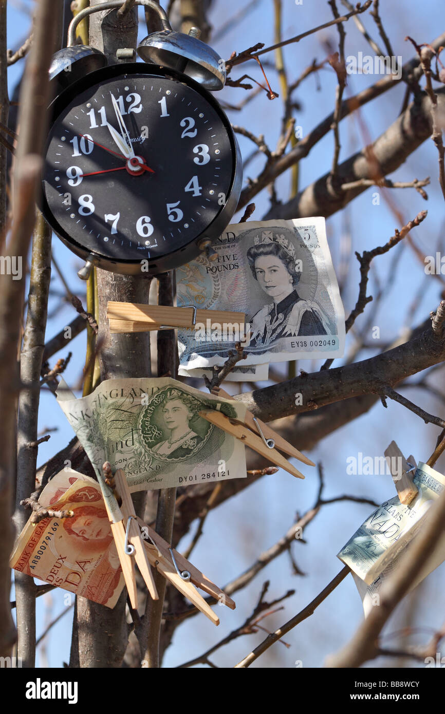 time and money growing on trees cold cash clock Stock Photo - Alamy