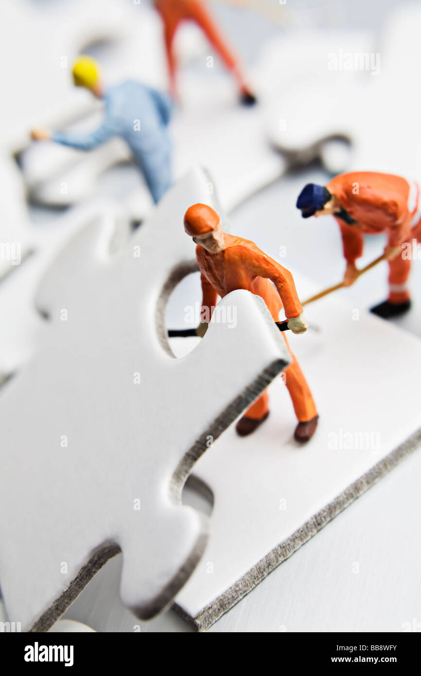 Putting the pieces back together Stock Photo - Alamy