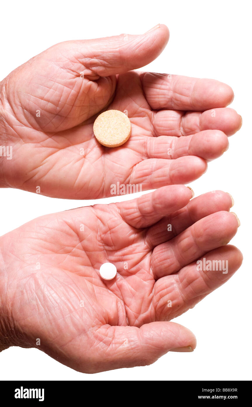 Doctor hands holding pile vitamin hi-res stock photography and images ...