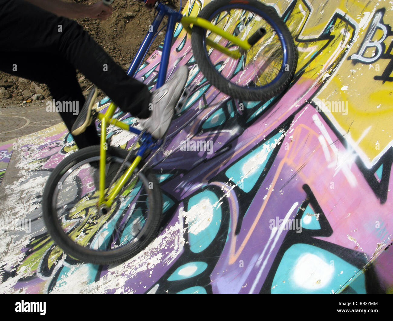 person doing bike stunts on ramp at event outdoors Stock Photo - Alamy