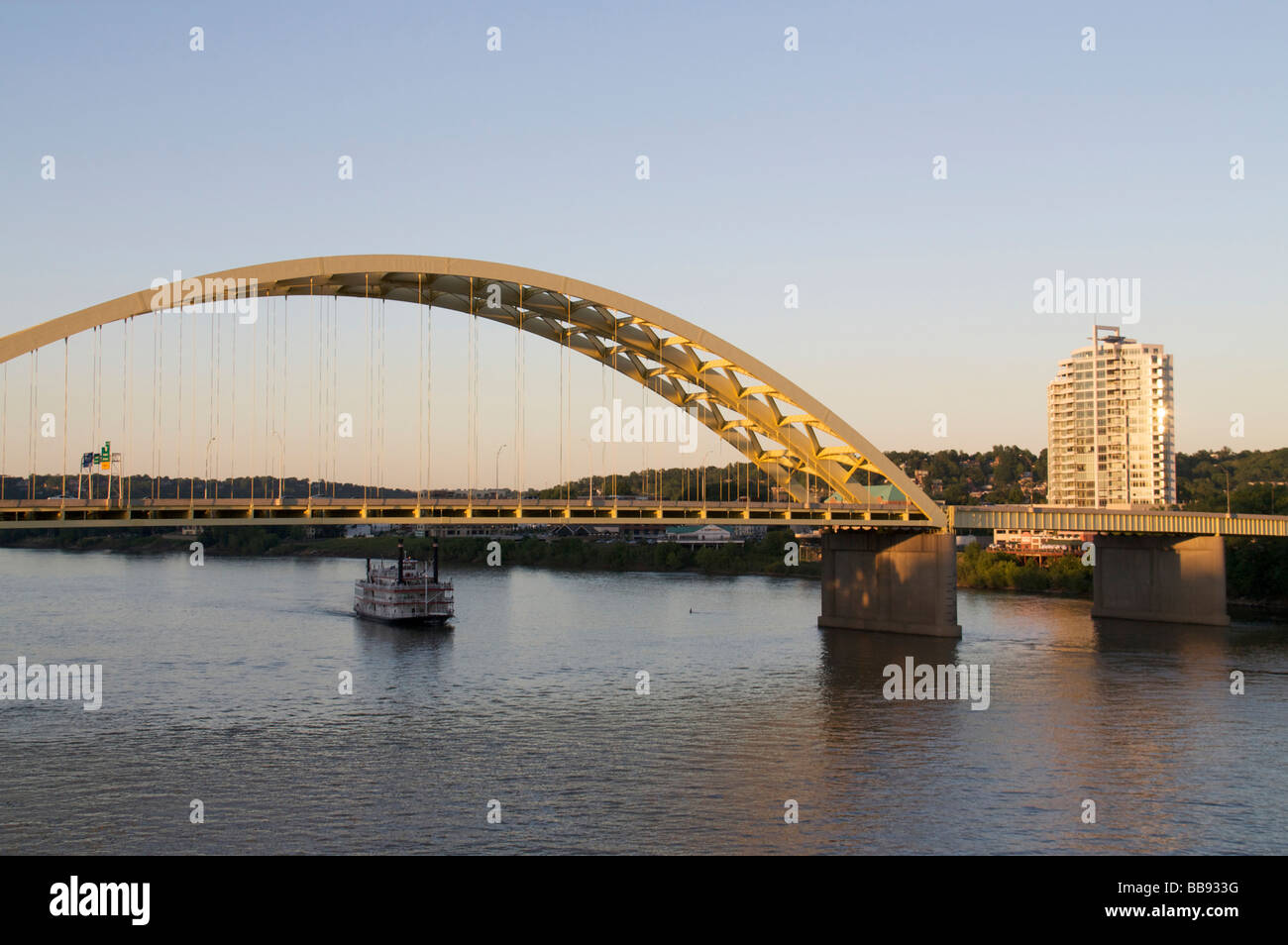 Belle of Cincinnati Riverboat on Ohio River passing under Interstate ...