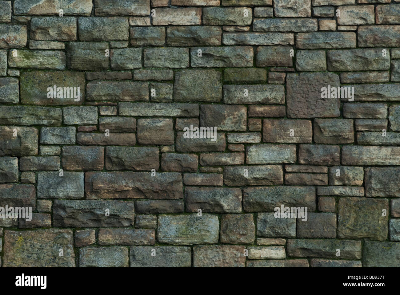 A wall made of natural stone bricks Stock Photo - Alamy