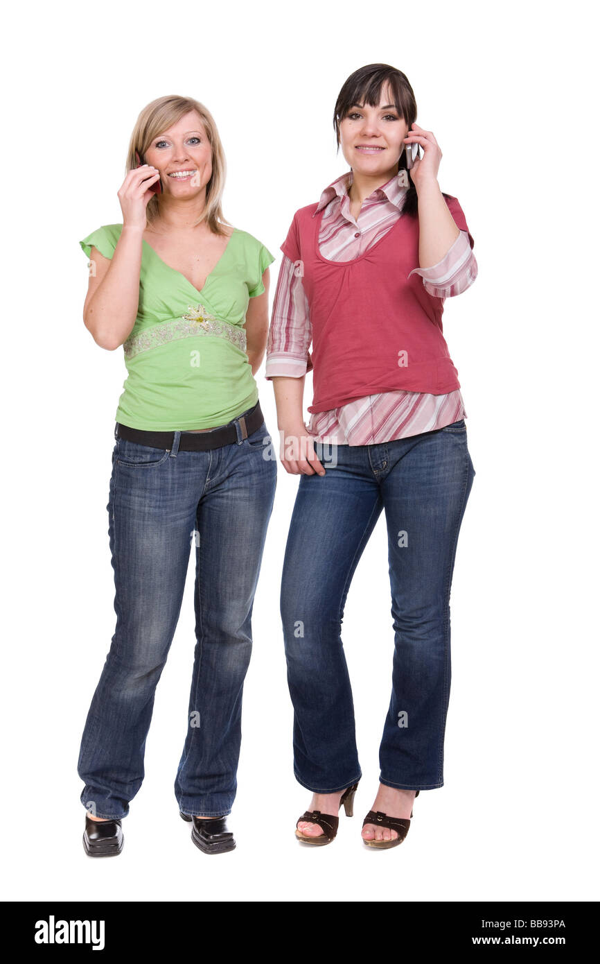 two attractive women with mobile phones Stock Photo - Alamy