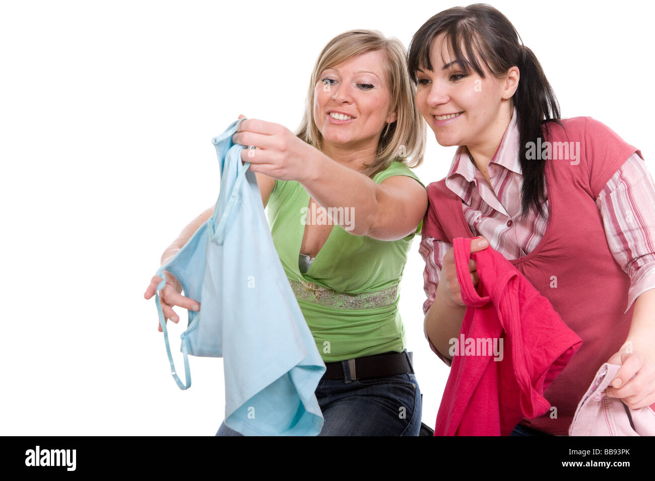 two attractive women with clothes Stock Photo - Alamy
