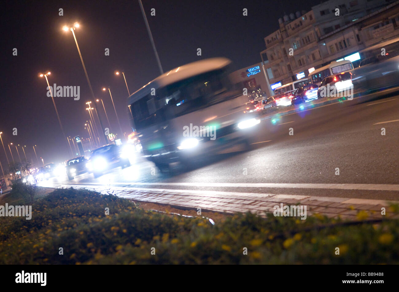 Traffic at night with light trails in Doha Qatar Stock Photo - Alamy