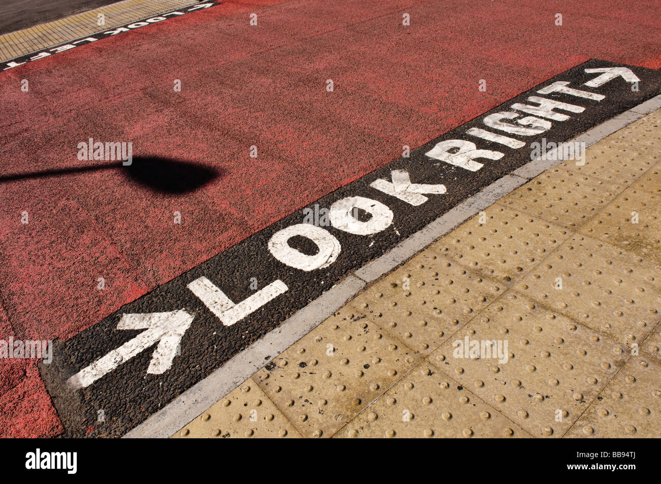 "Look Right" painted on road at pedestrian crossing Stock Photo - Alamy