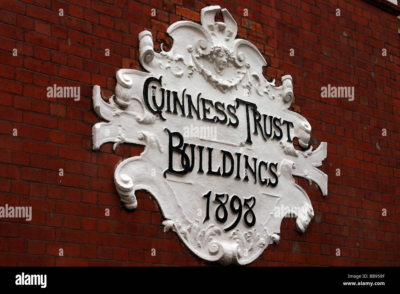 Guinness Trust Buildings date plaque London UK Stock Photo - Alamy