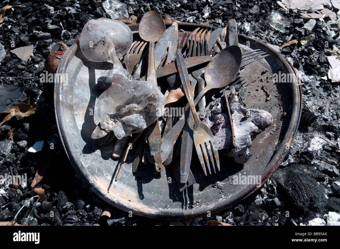 Remains of household objects after a devastating bushfire Stock Photo ...