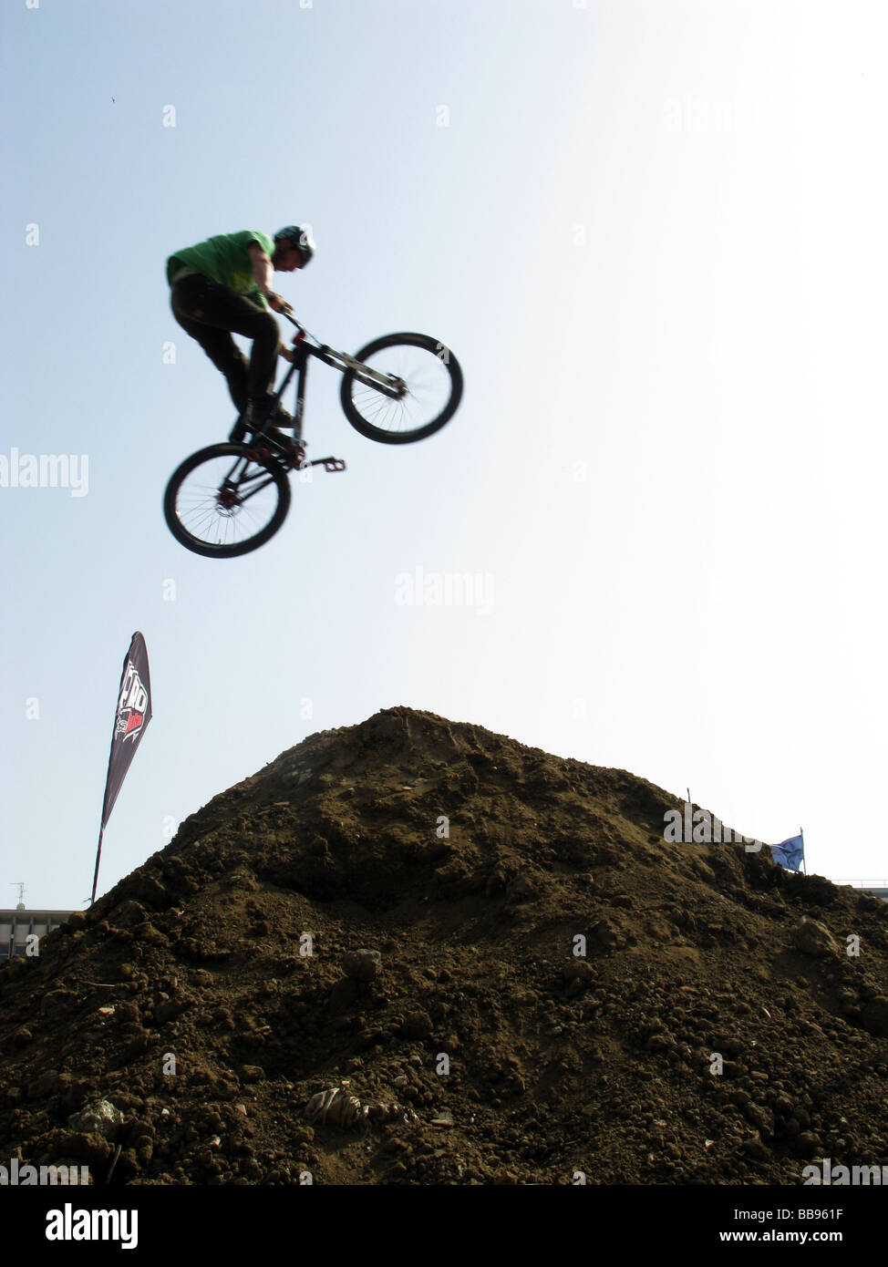 person doing bike stunts on ramp at event outdoors Stock Photo - Alamy