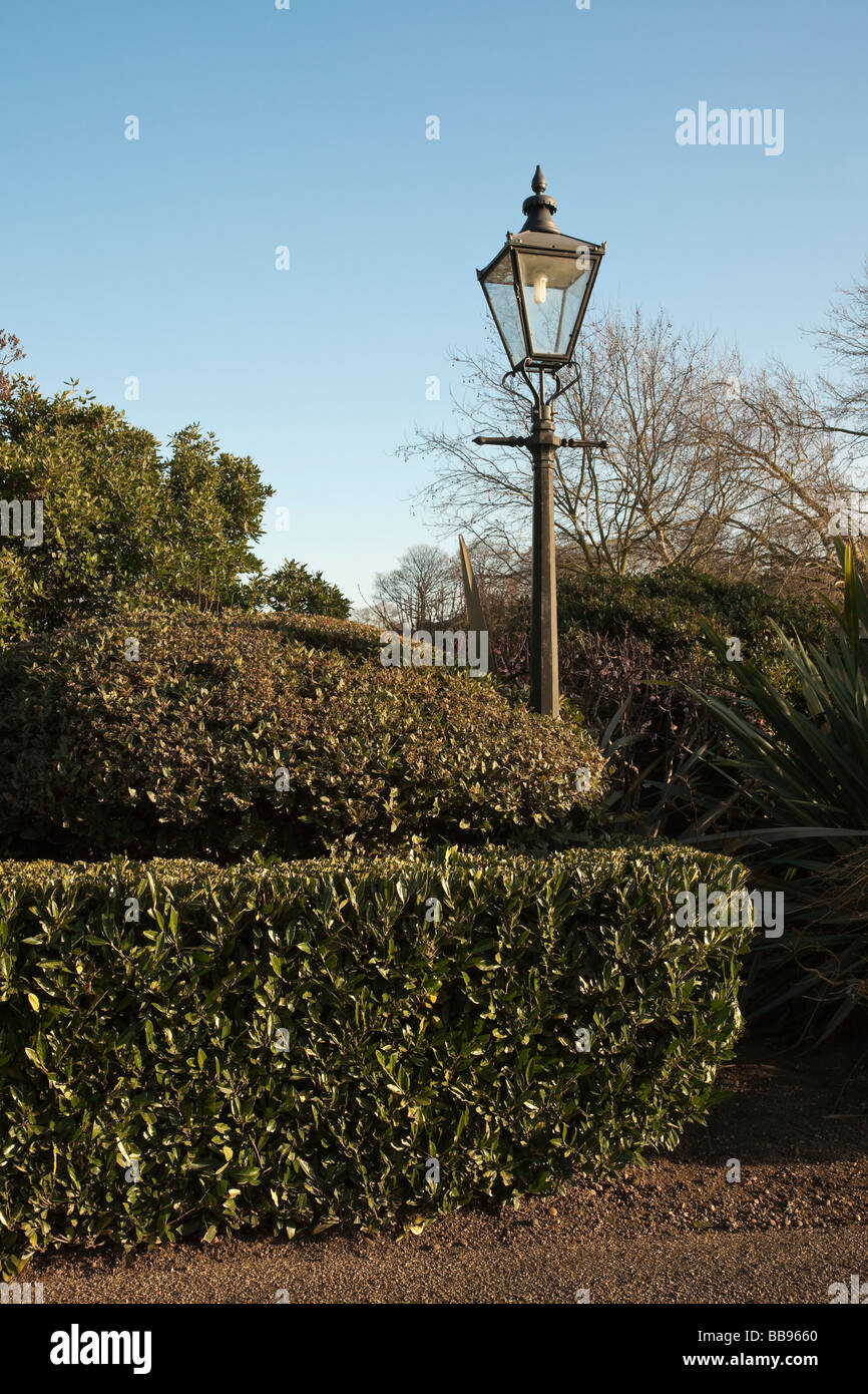 One old lamp post in park against clear sky at sunset Stock Photo - Alamy